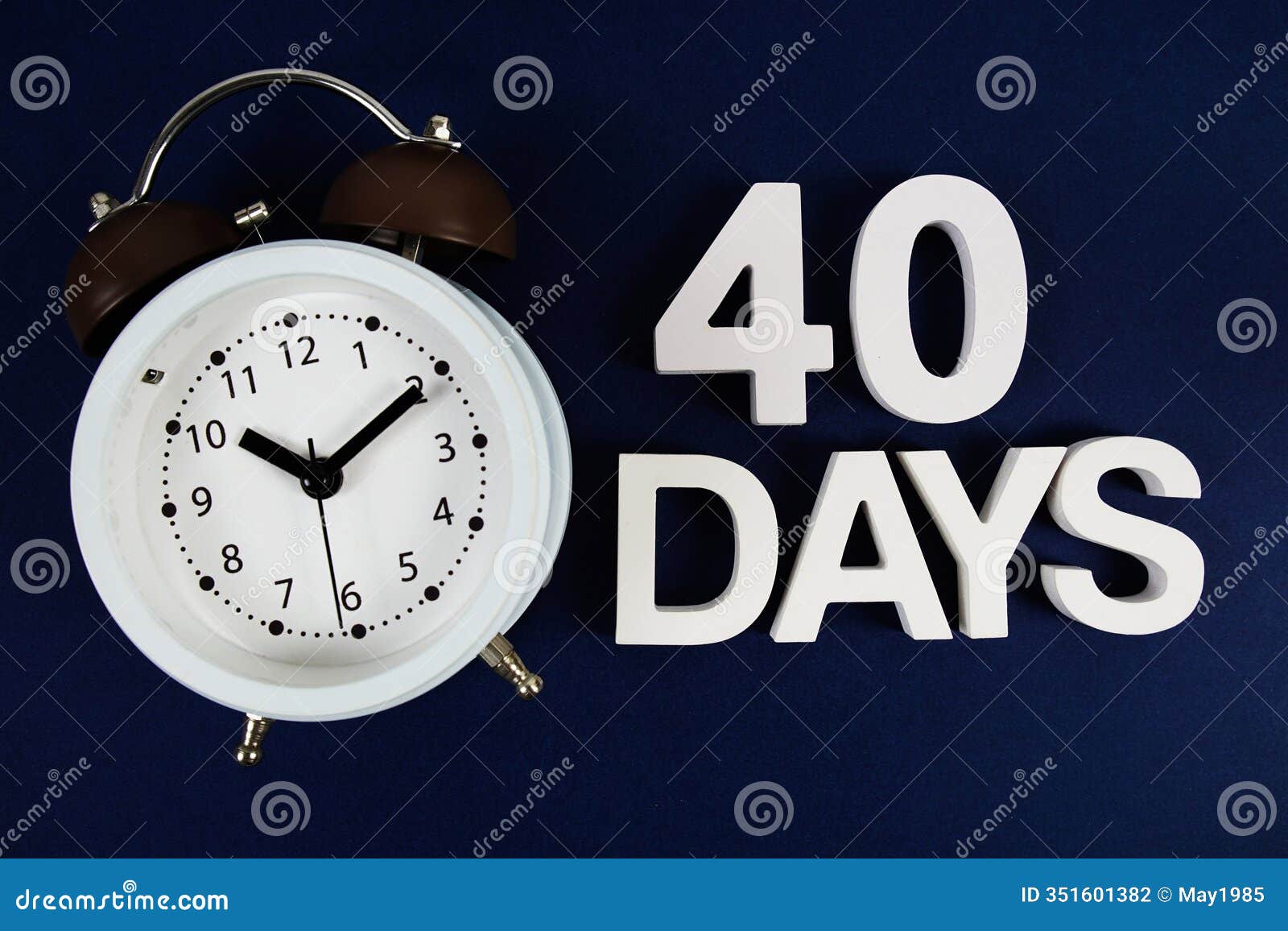 40 Days Alphabet Letters with Alarm Clock on Navy Blue Background Stock ...