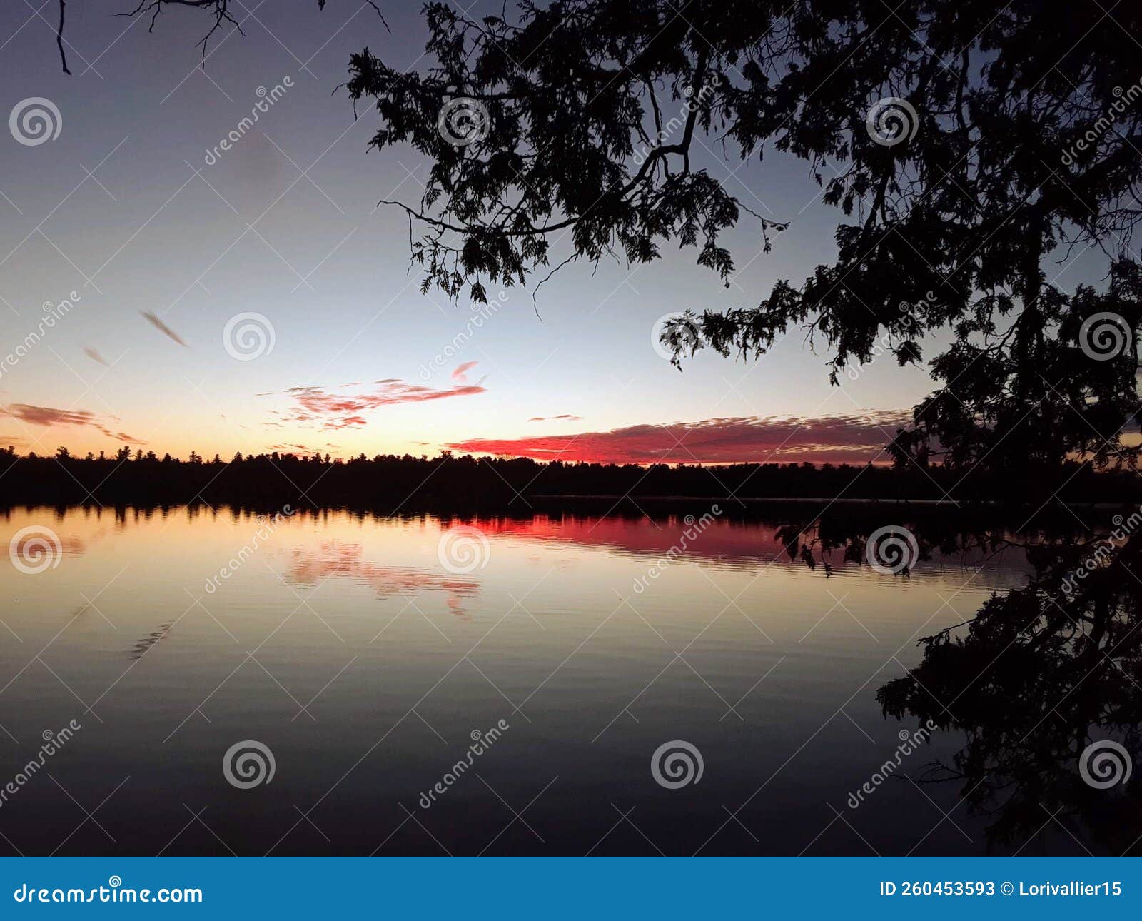 Dazzling Red Sunset stock image. Image of shore, sunrise - 260453593
