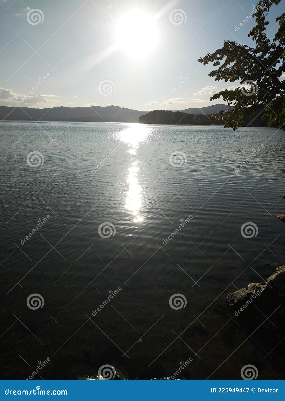 The Dazzling Sun at Sunset Over the Lake Stock Image - Image of ...