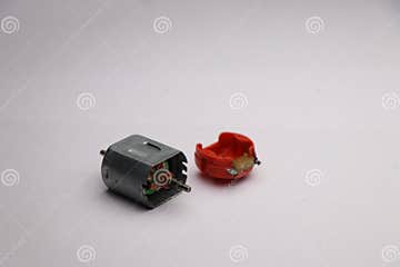 DC Motor Separated from Its Base with Visible Rotor and Shaft on White ...