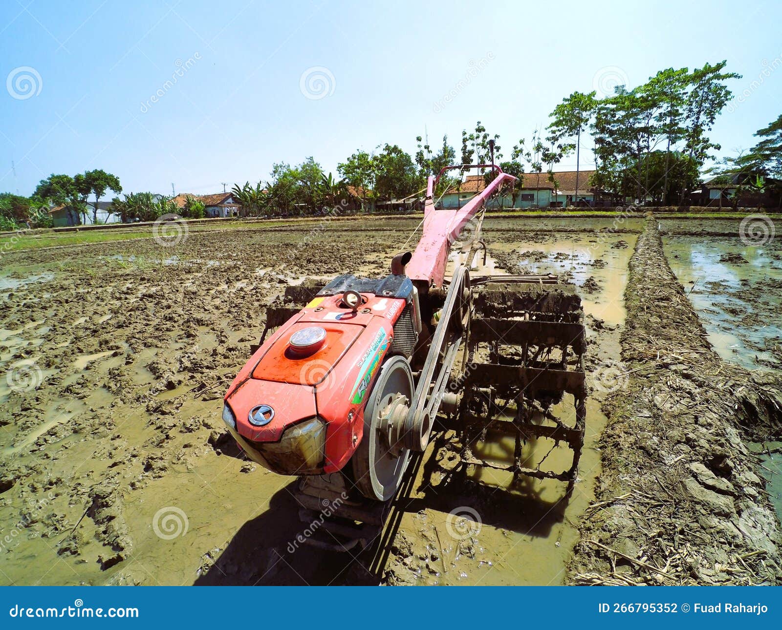 A Tractor in the Rice Field Stock Photo - Image of wetland, soil: 266795352
