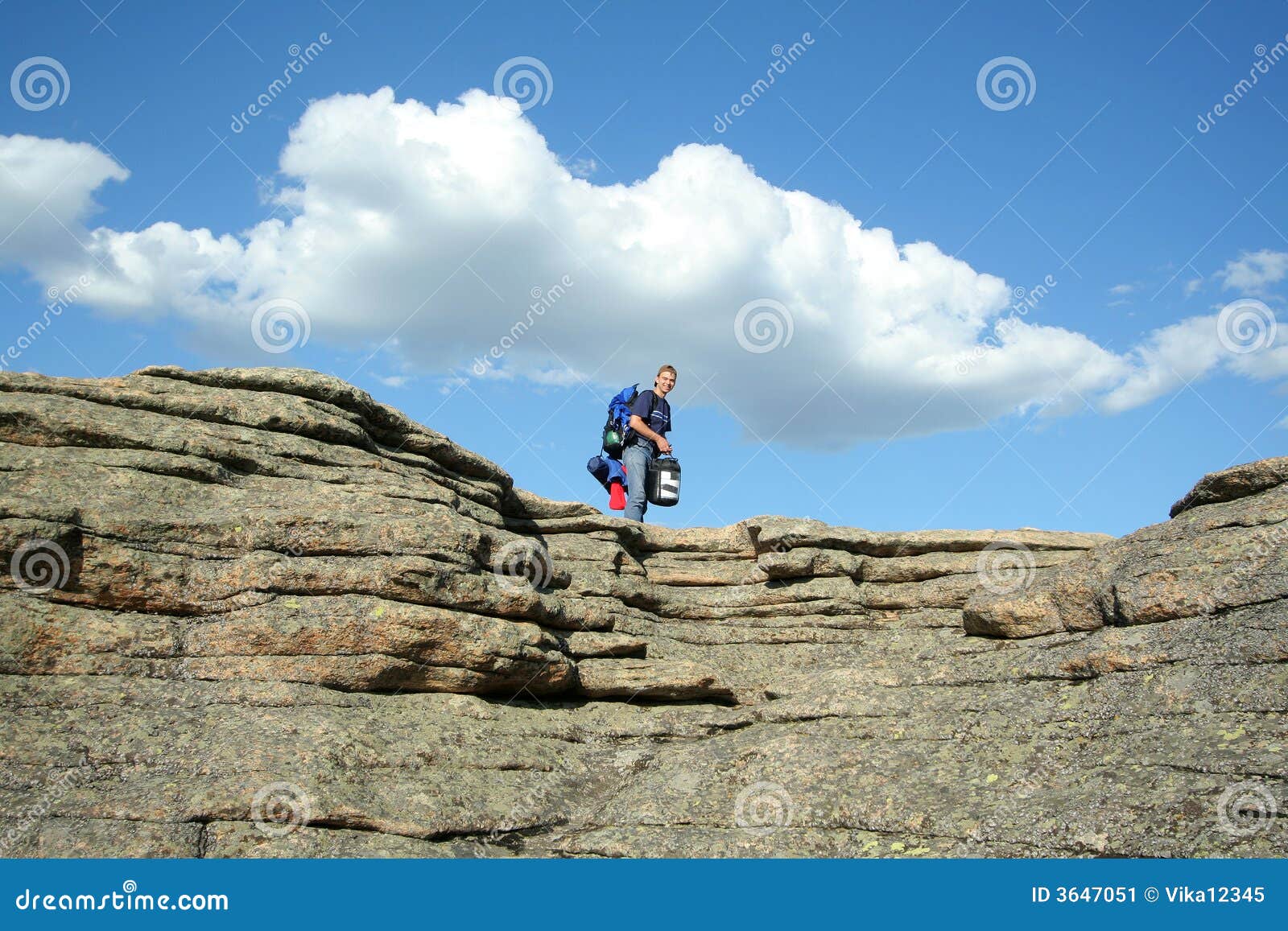 De persoon op een rots stock afbeelding. Image of menselijk - 3647051