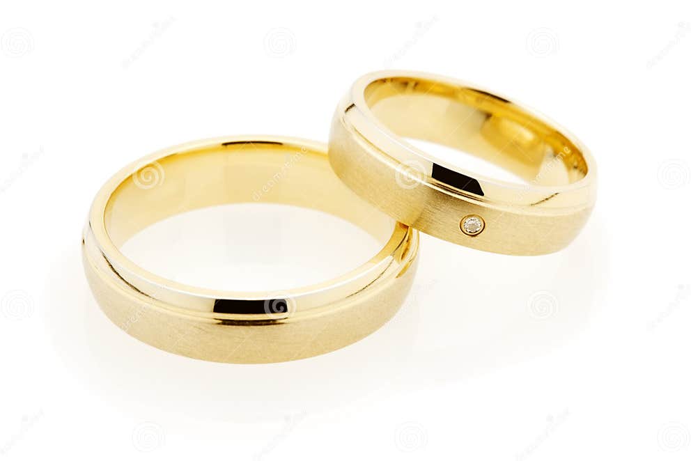 De Ringen Van De Gouden Bruiloft Op Wit Stock Afbeelding - Image of ...