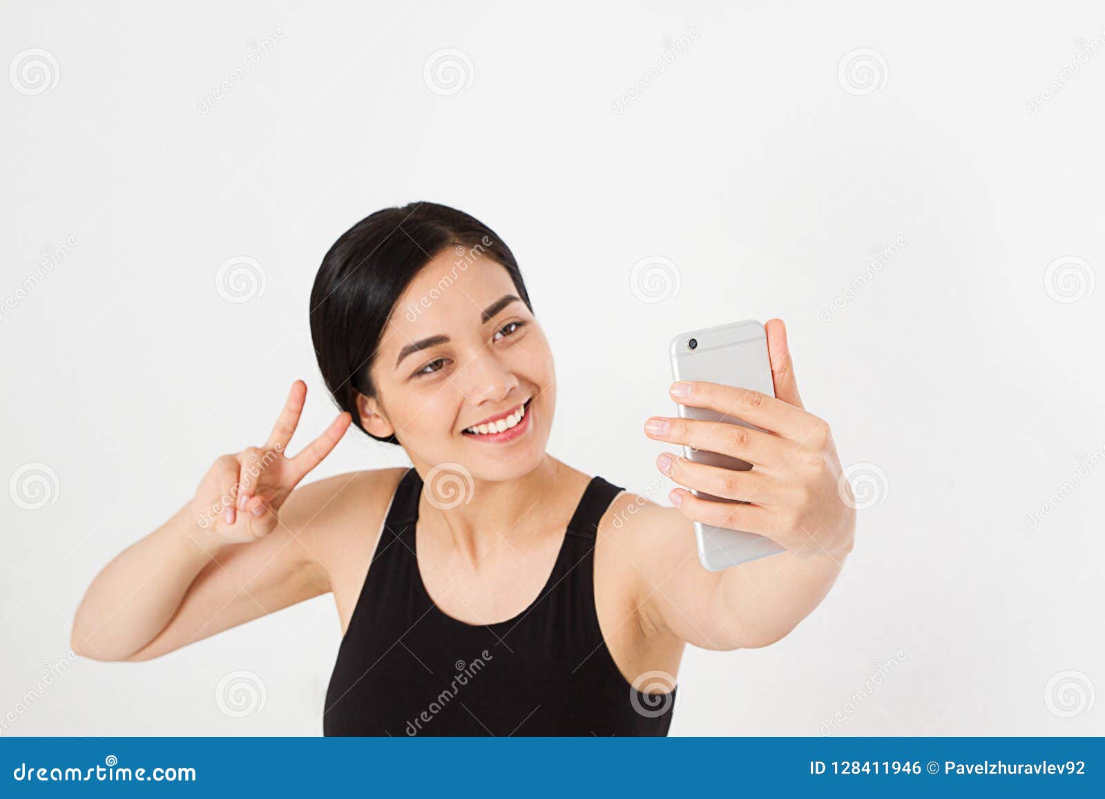 De Vrij Aziatische Koreaanse Vrouw Die Een Selfie Nemen Die En Toont