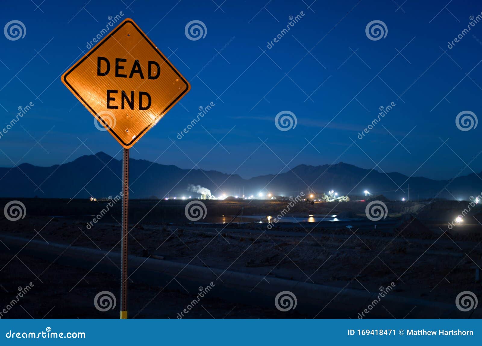 Dead End Sign with Construction in the Background Stock Image - Image ...