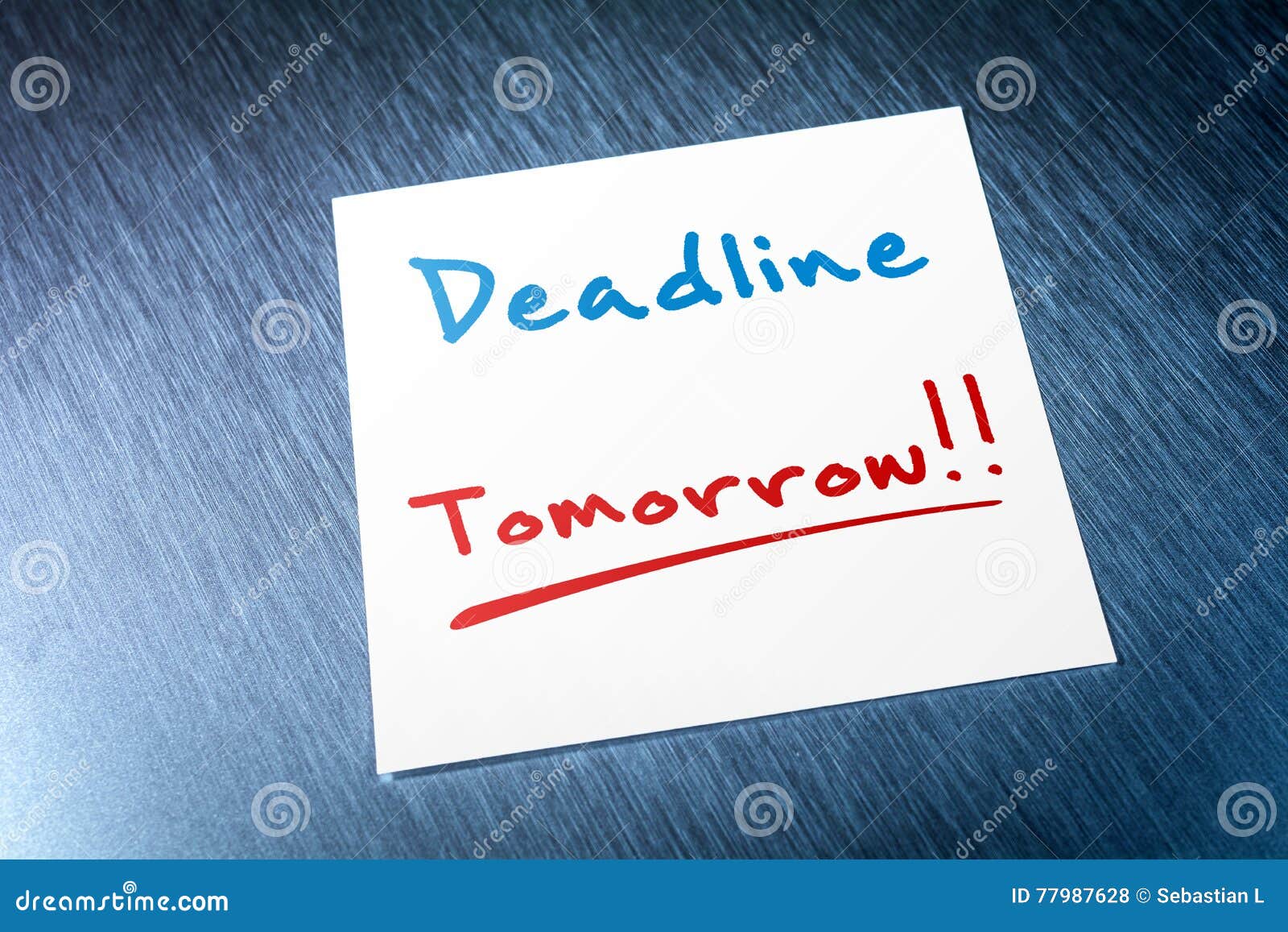 Deadline Sticky Note for Tomorrow on Paper on Brushed Aluminum of ...