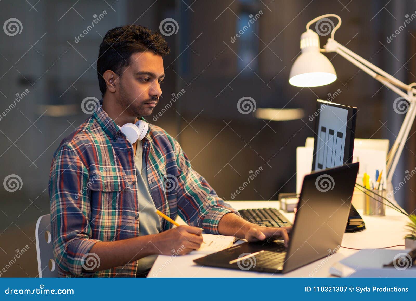 Creative Man with Laptop Working at Night Office Stock Image - Image of ...