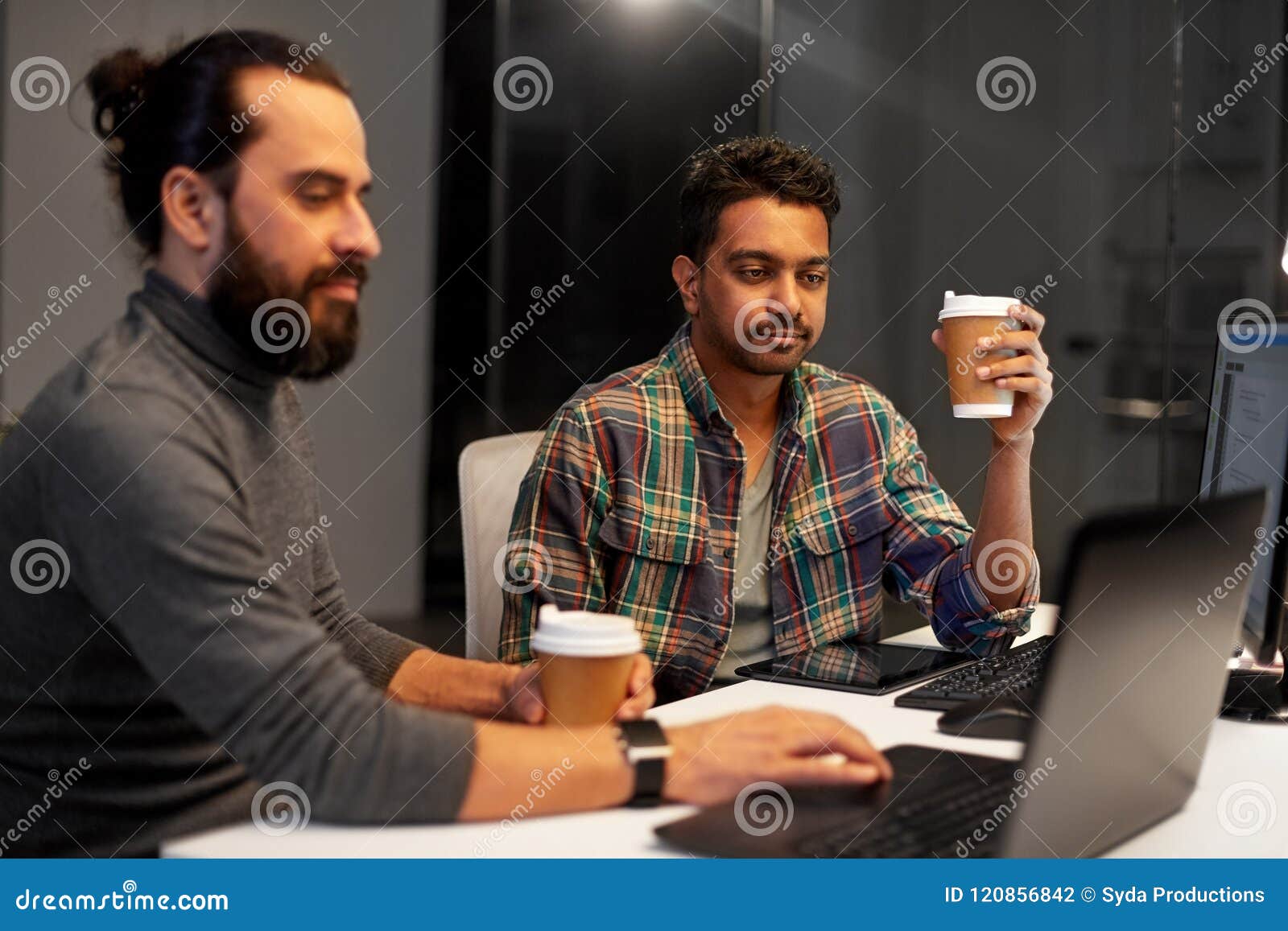 Creative Team Drinking Coffee at Night Office Stock Photo - Image of ...