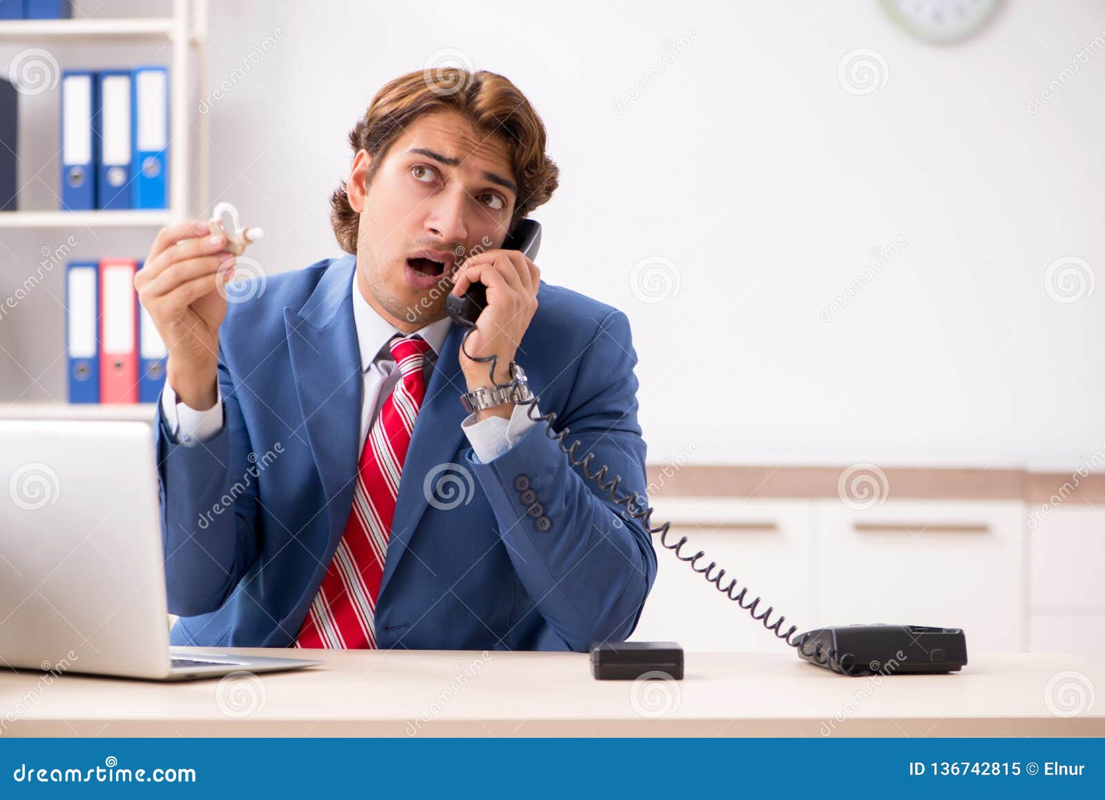 The Deaf Employee Using Hearing Aid in Office Stock Image - Image of ...