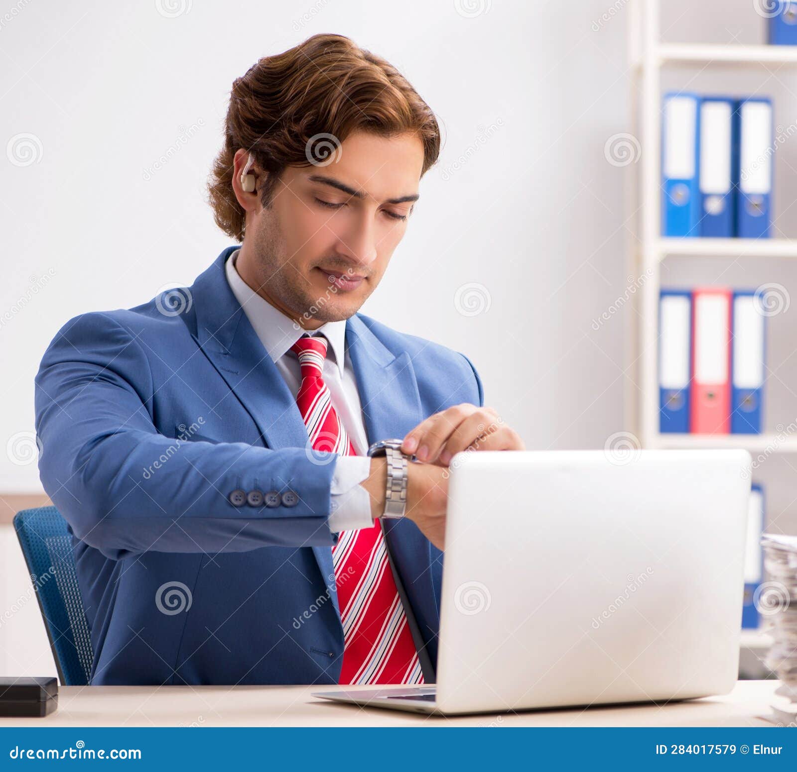 Deaf Employee Using Hearing Aid in Office Stock Image - Image of ...