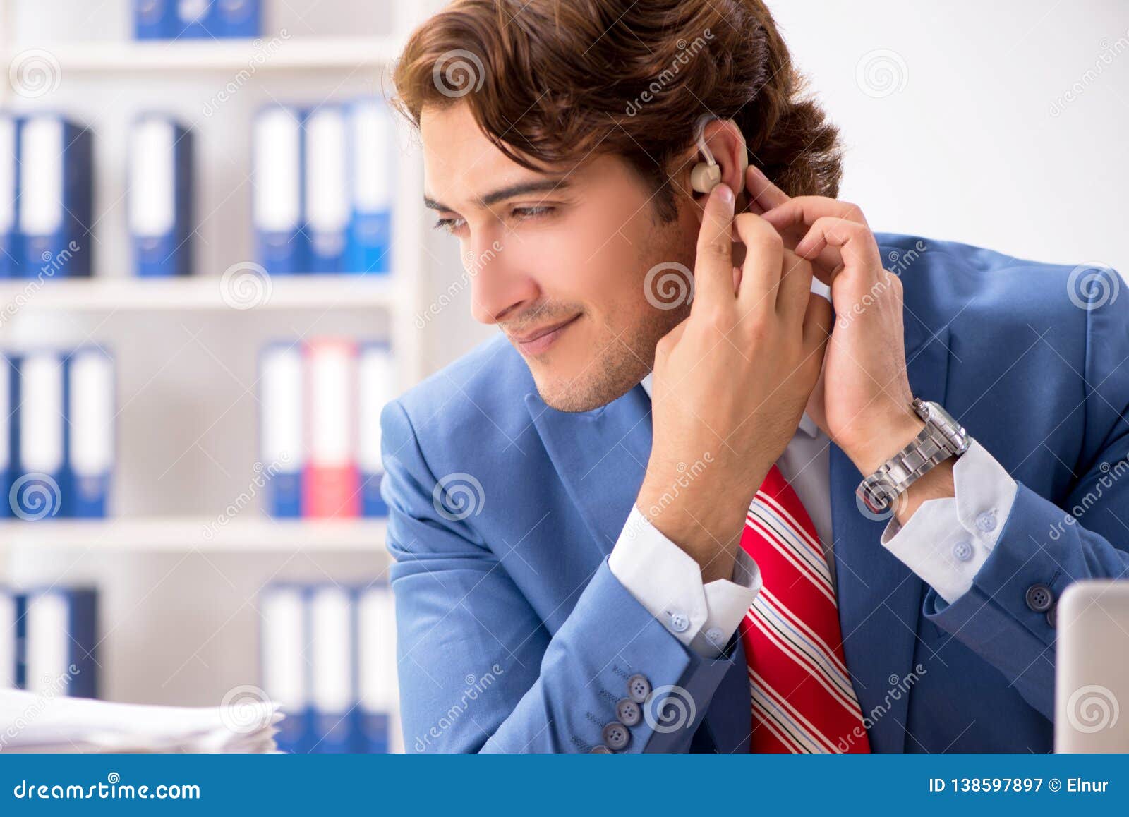 The Deaf Employee Using Hearing Aid in Office Stock Image - Image of ...