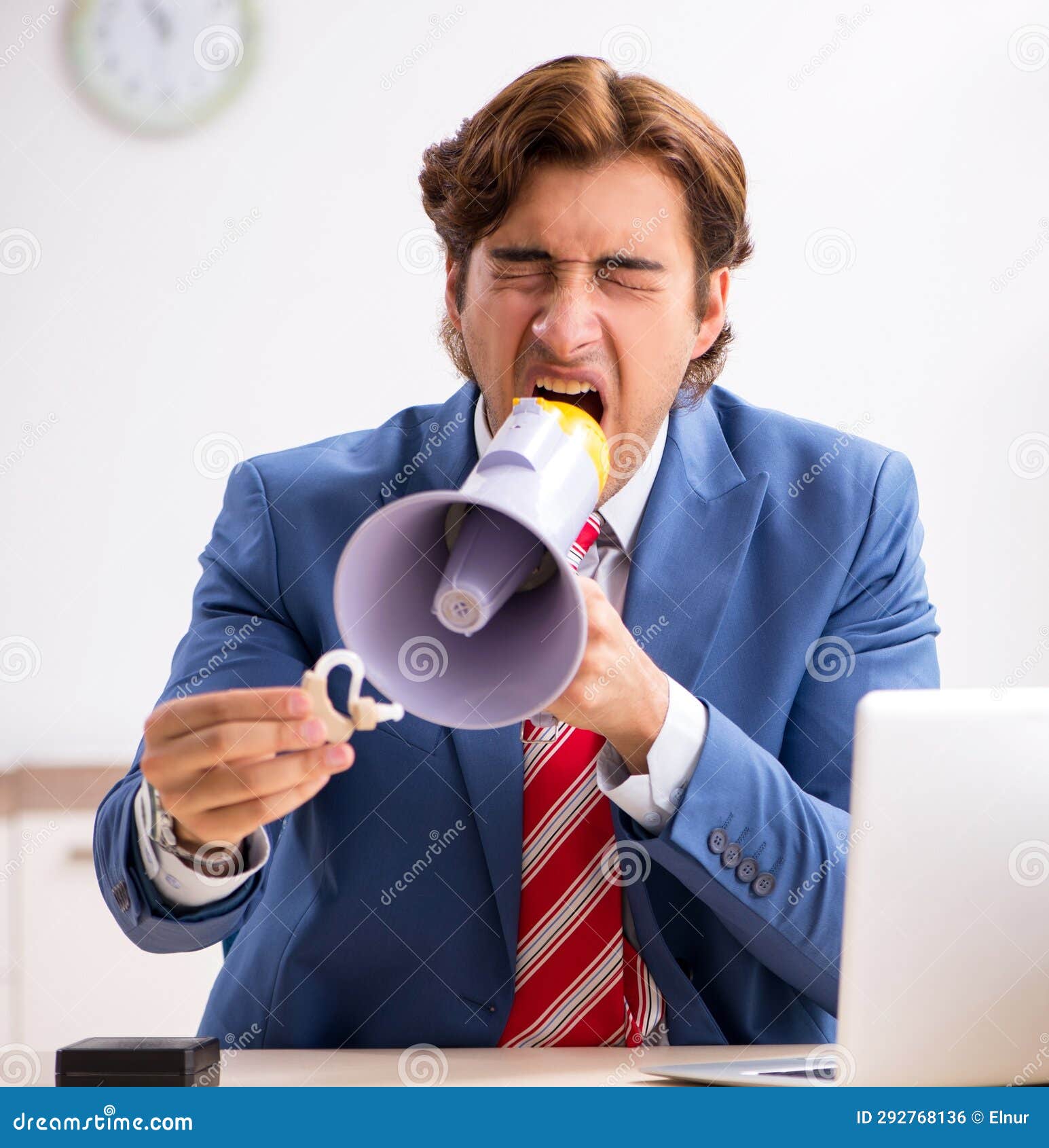 Deaf Employee Using Hearing Aid in Office Stock Photo - Image of ...