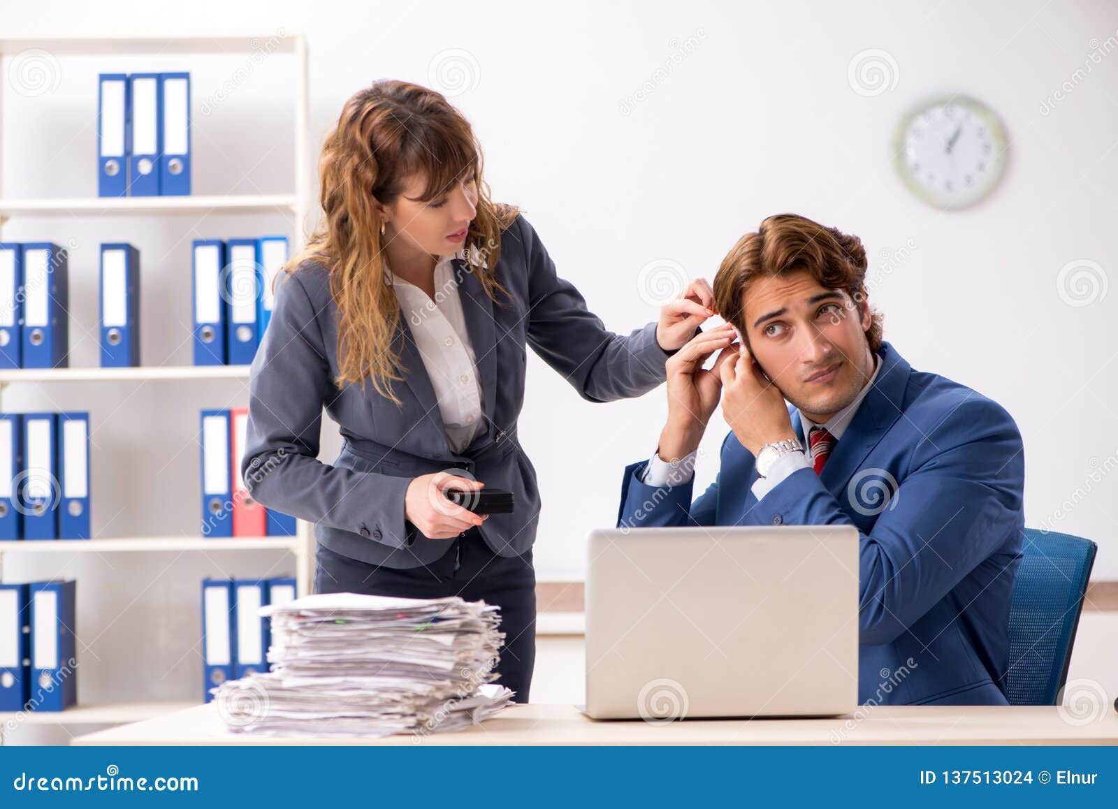 The Deaf Employee Using Hearing Aid Talking To Boss Stock Photo - Image ...