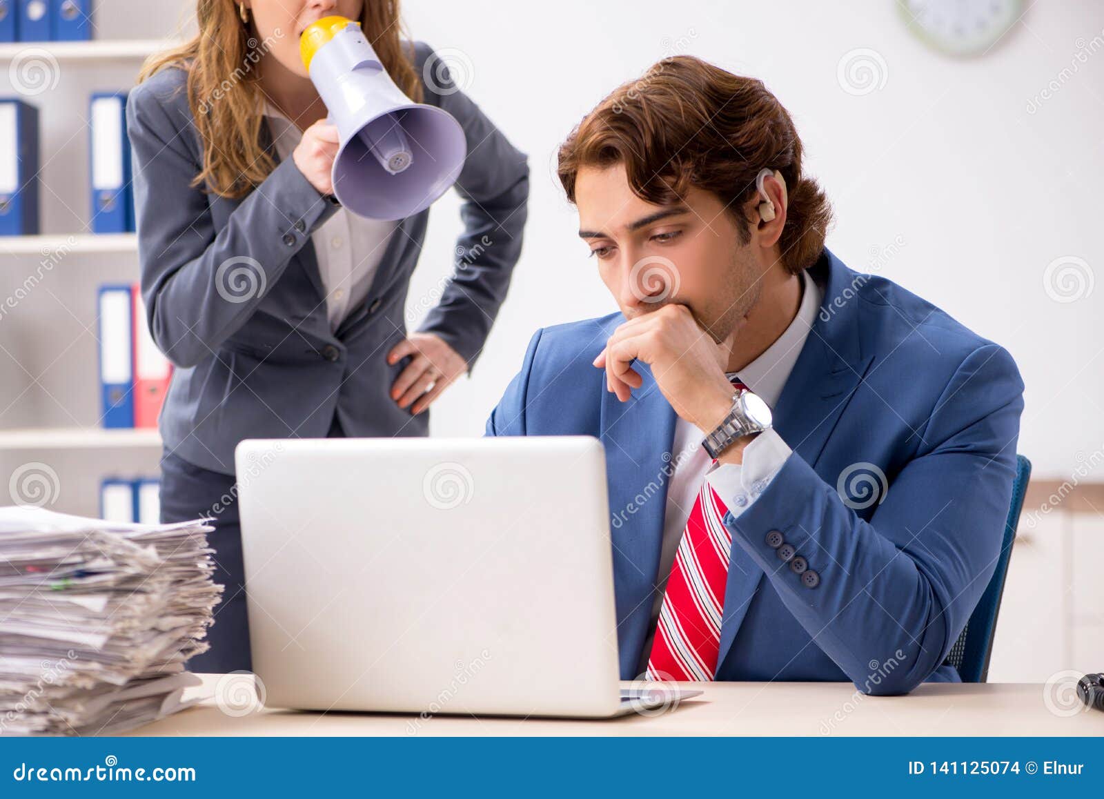 The Deaf Employee Using Hearing Aid In Office Royalty-Free Stock Image ...
