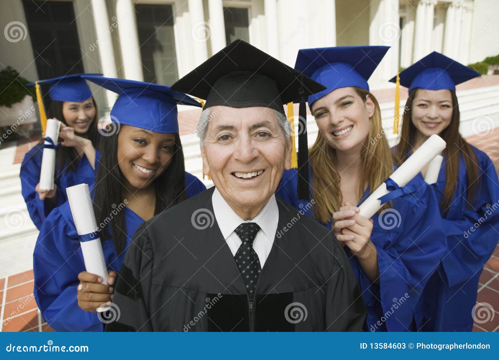 Dean and Graduates Outside University Stock Image - Image of looking ...