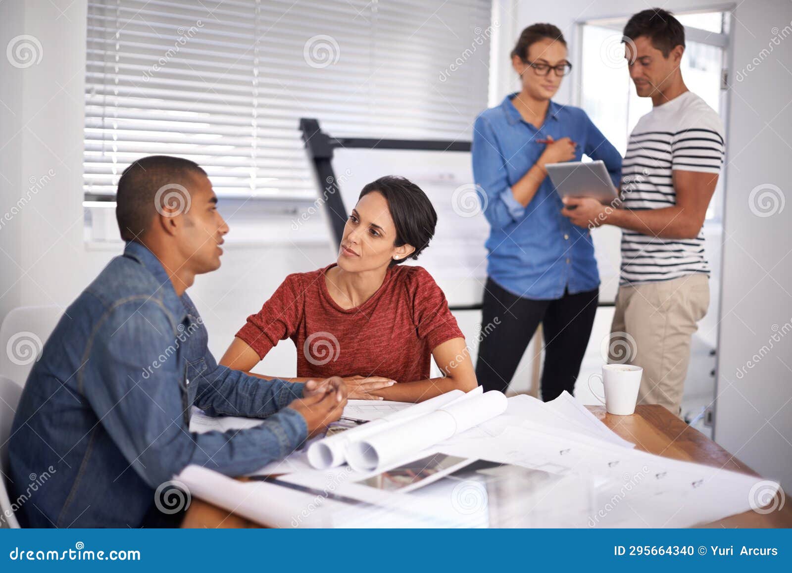 Debating the Design Ensures Its Perfection. a Group of Young Designers ...