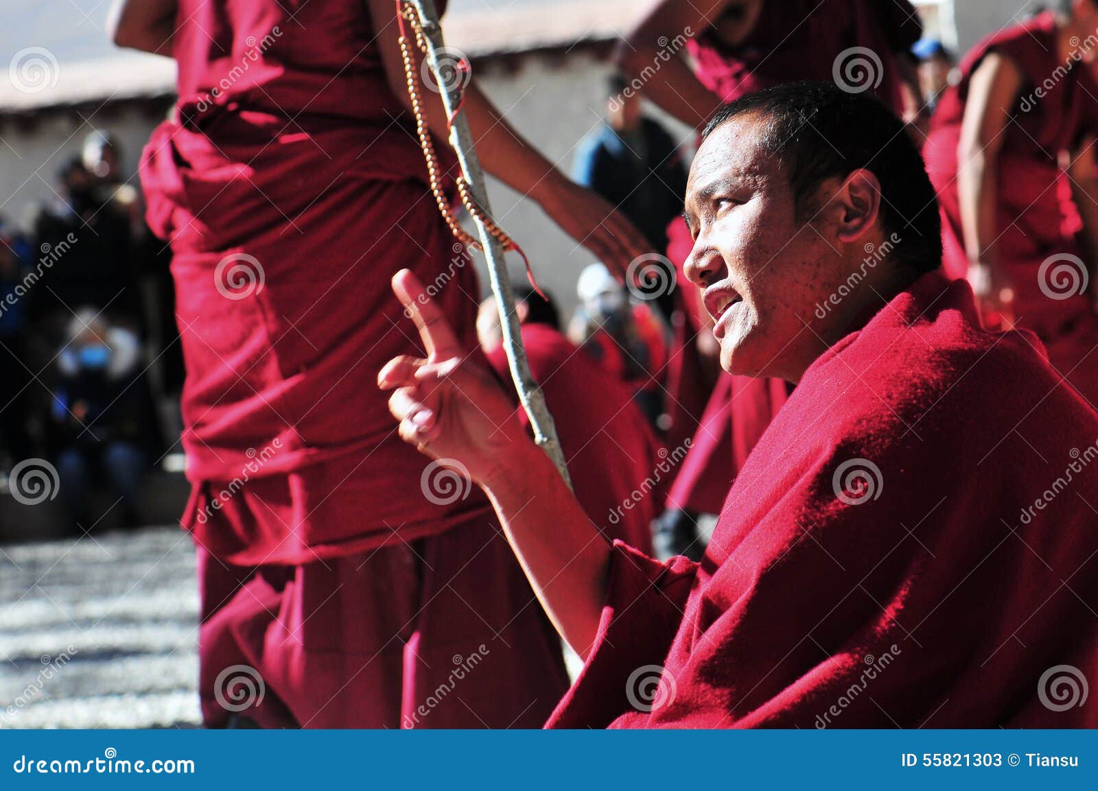 Debating monks in Tibet editorial stock photo. Image of debate - 55821303