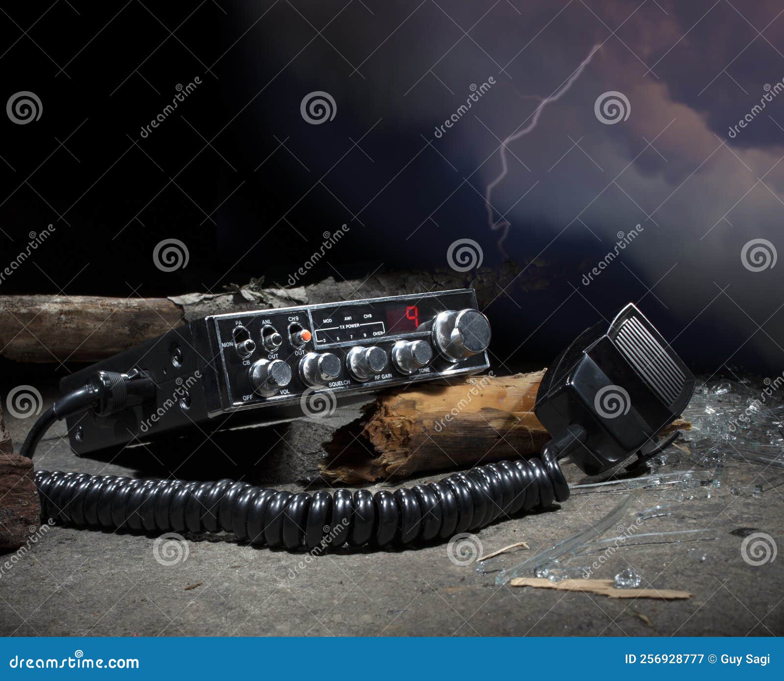 Debris Around an Emergency Radio with a Storm Behind Stock Image ...