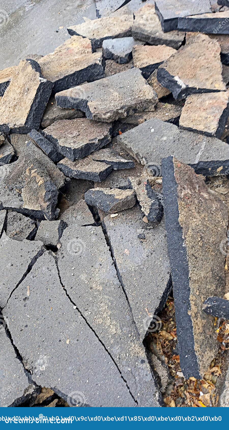 Debris of Broken Asphalt Pavement. Preparation for the Construction of ...
