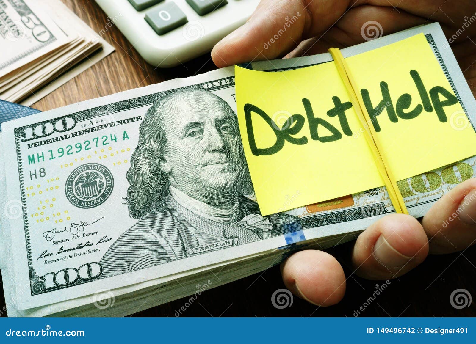 Debt Help Concept. Hand Holding Stack of Money Stock Photo - Image of ...