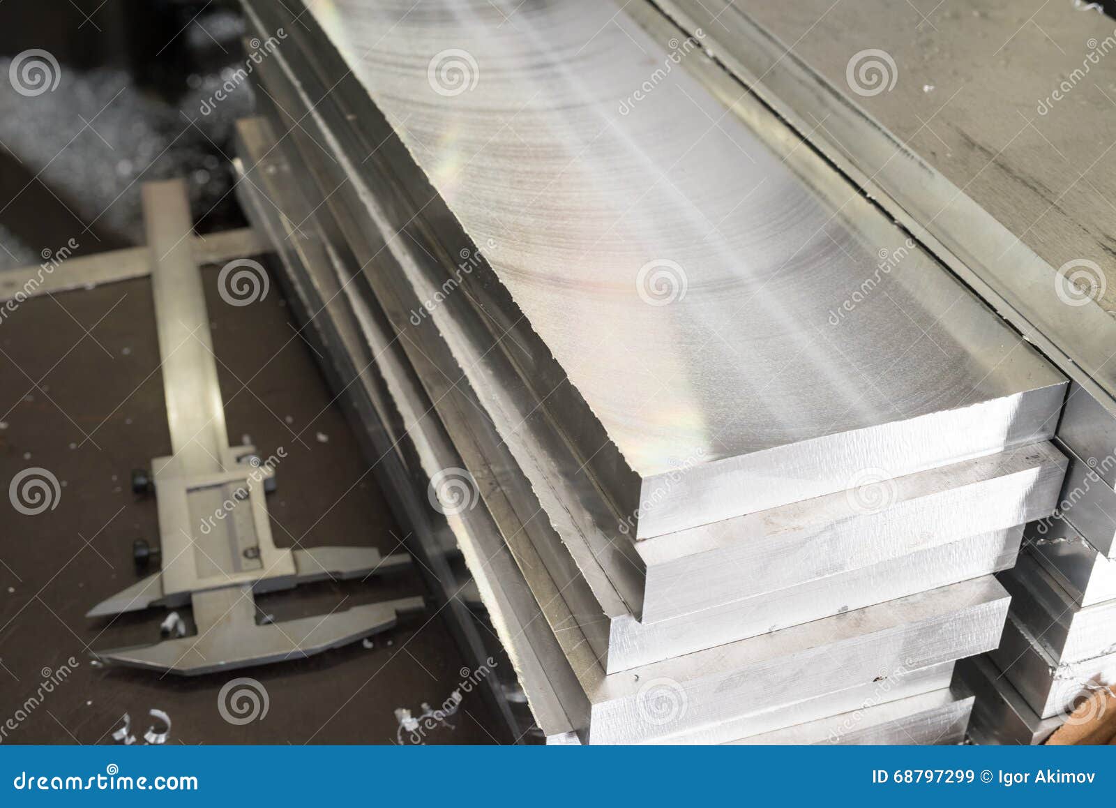 Deburring of Steel Plates after Milling. in His Hand a Simple Cu Stock ...