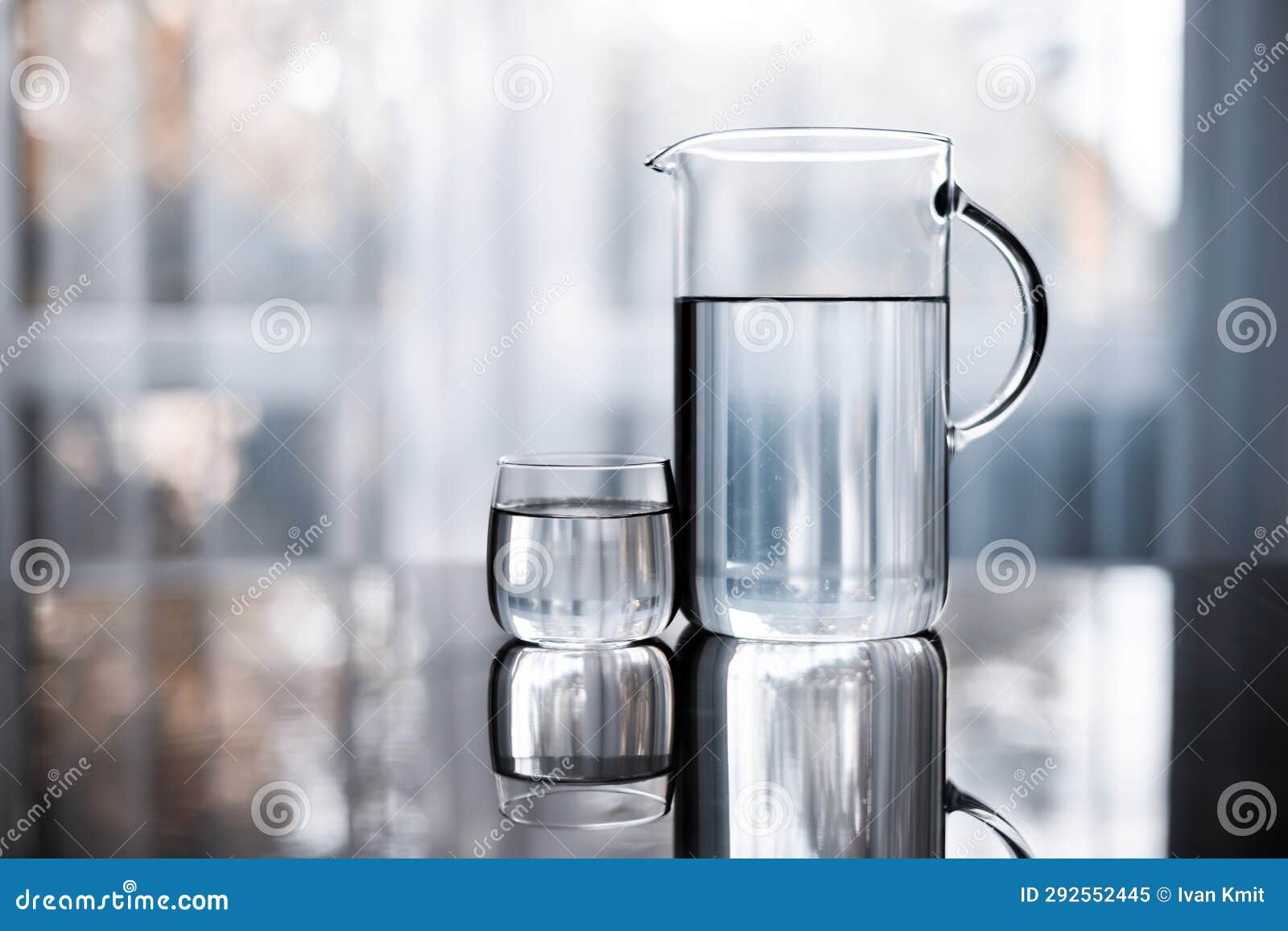 Decanter and Glass of Water on Table Stock Image - Image of table ...