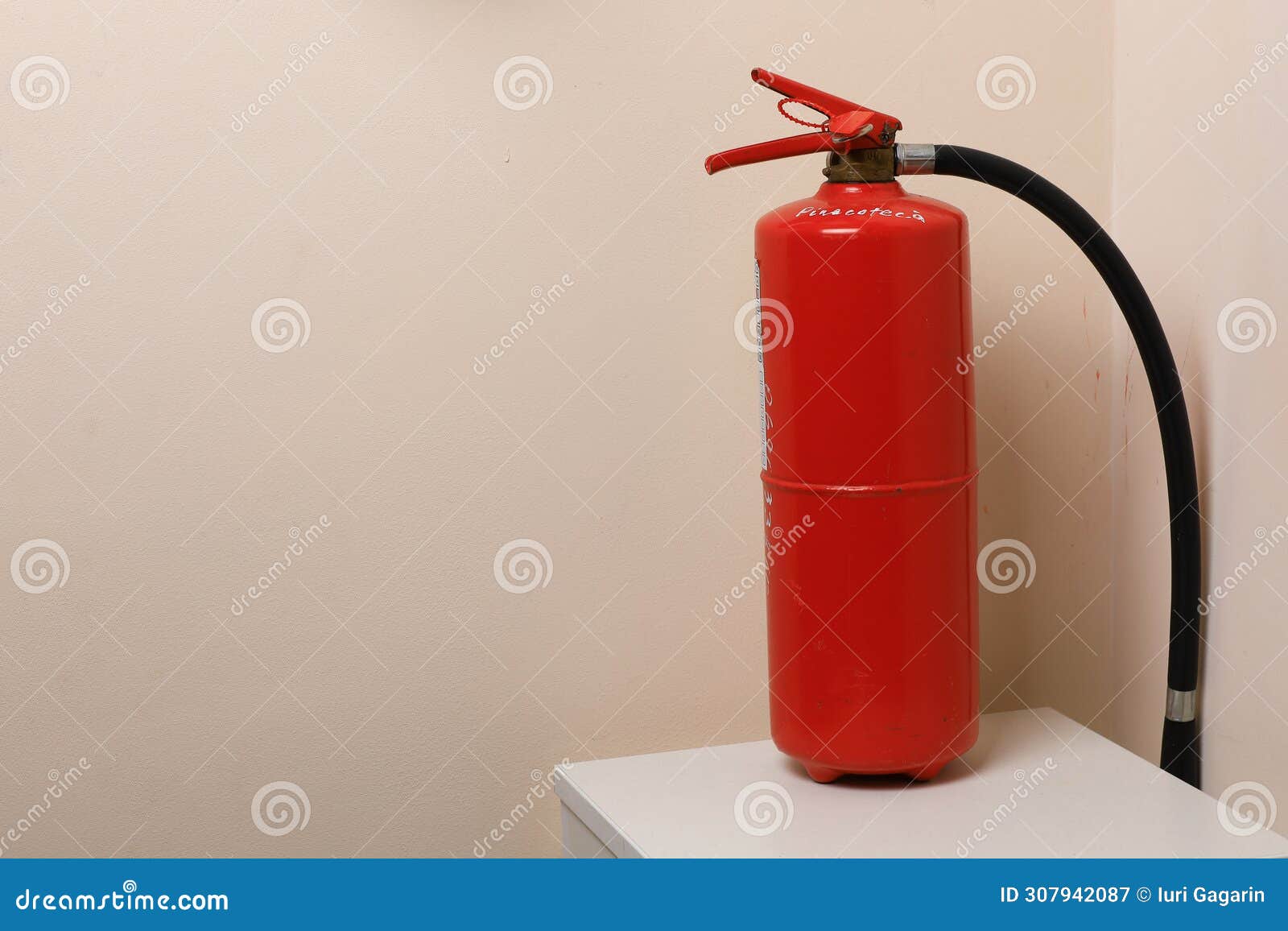 December 5, 2023 Balti Moldova. Fire Extinguisher on a Stand. Fire ...