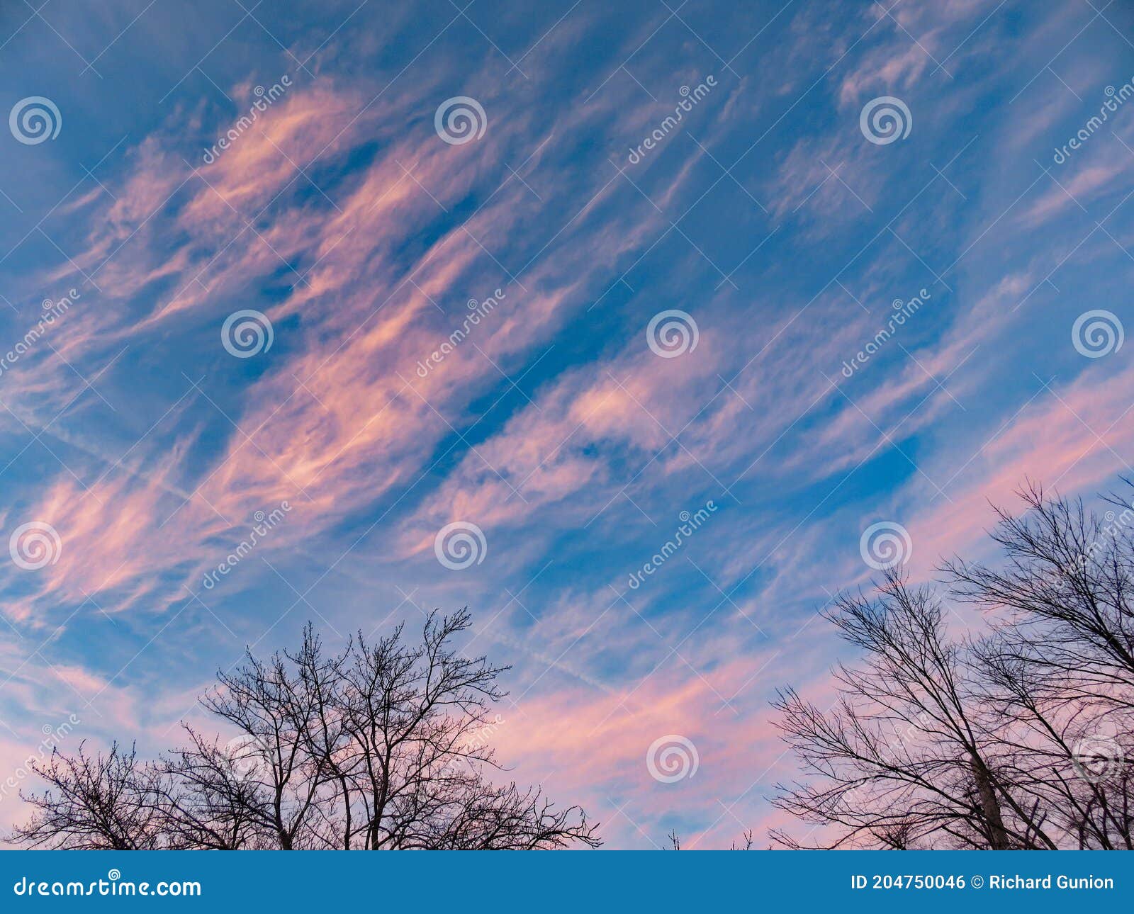 December Sunset and Clouds stock photo. Image of december - 204750046