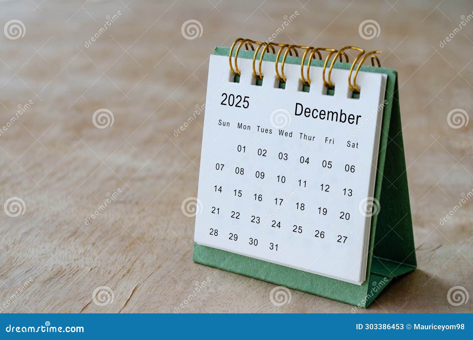December 2025 Table Calendar on Wooden Desk with Customizable Space for ...