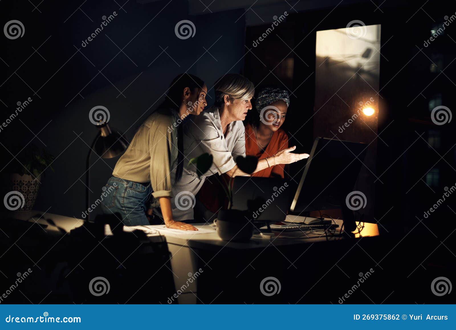 Deciding on a Plan Forward. a Group of Businesswomen Working Together ...