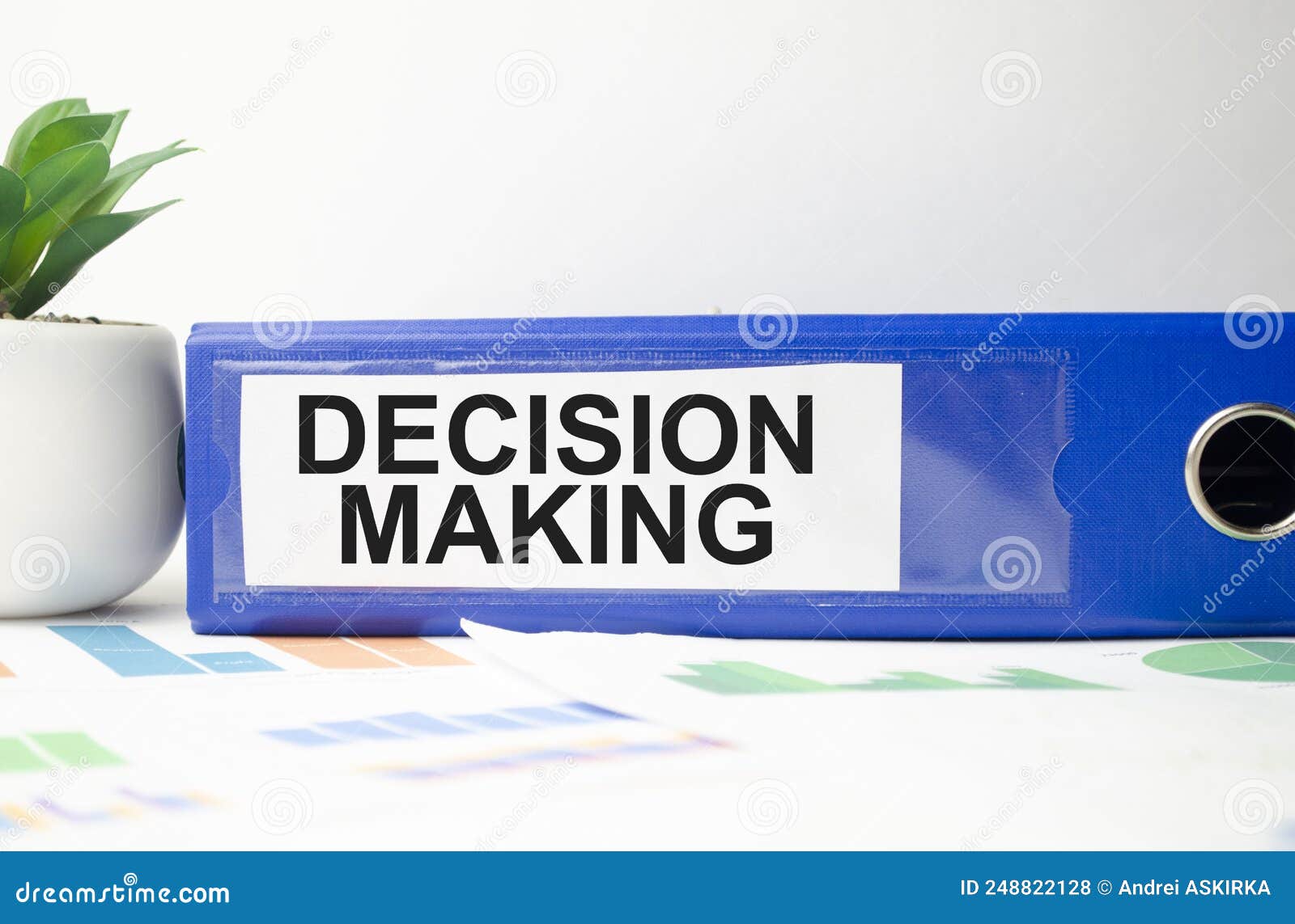 Decision Making Words on Blue File Folder and Charts Stock Photo ...