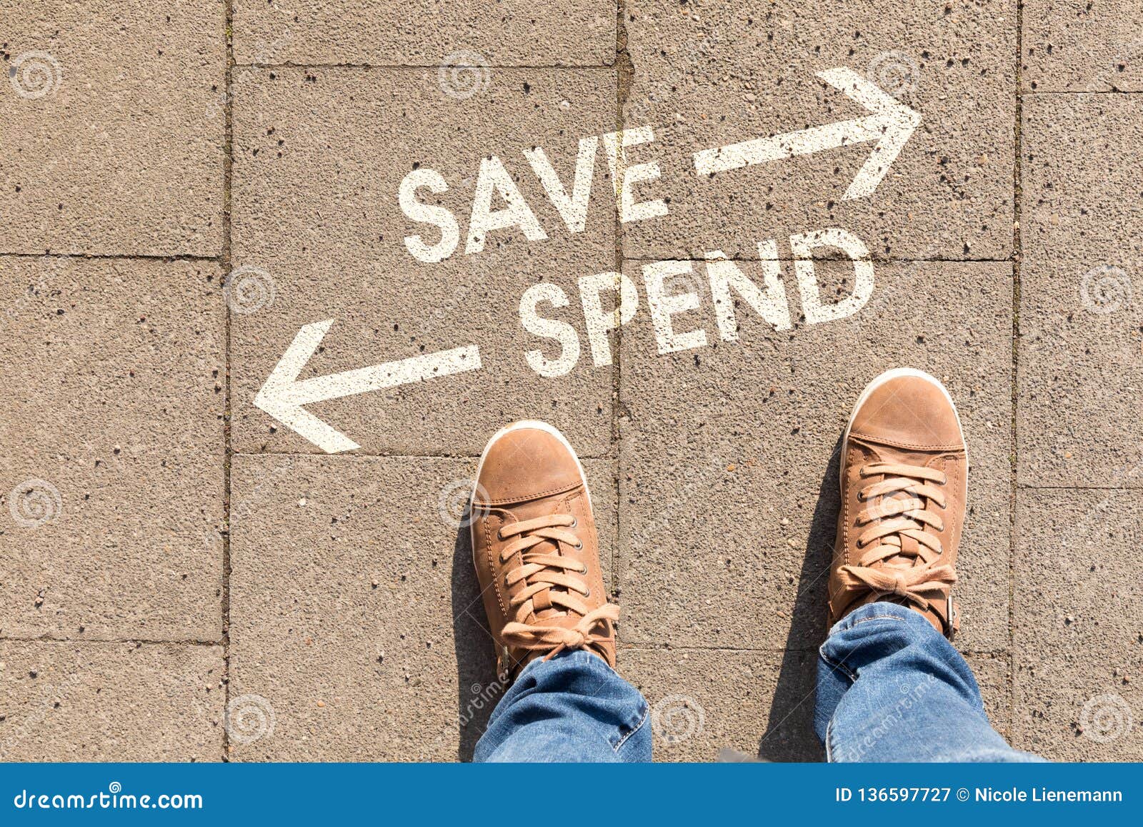 Save And Spend Words Written On Papers On A Tree With Arrow Signs ...