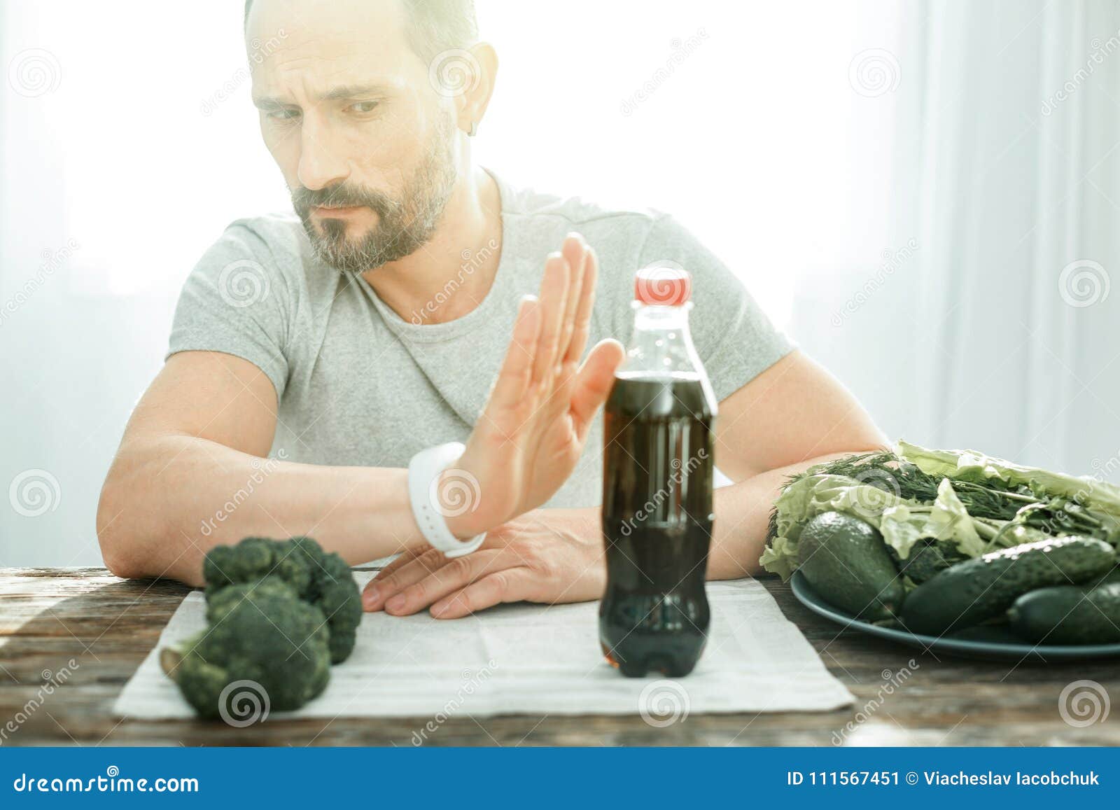 Decisive Serious Man Sitting and Refusing To Drink. Stock Image - Image ...
