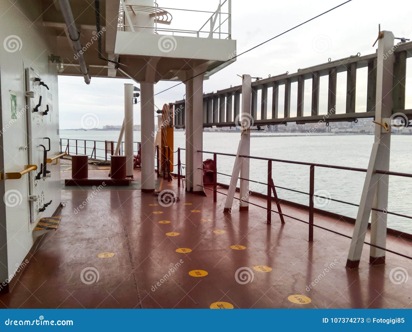 The Deck Of A Cargo Ship. Red Floor And White Walls. Stock Image ...