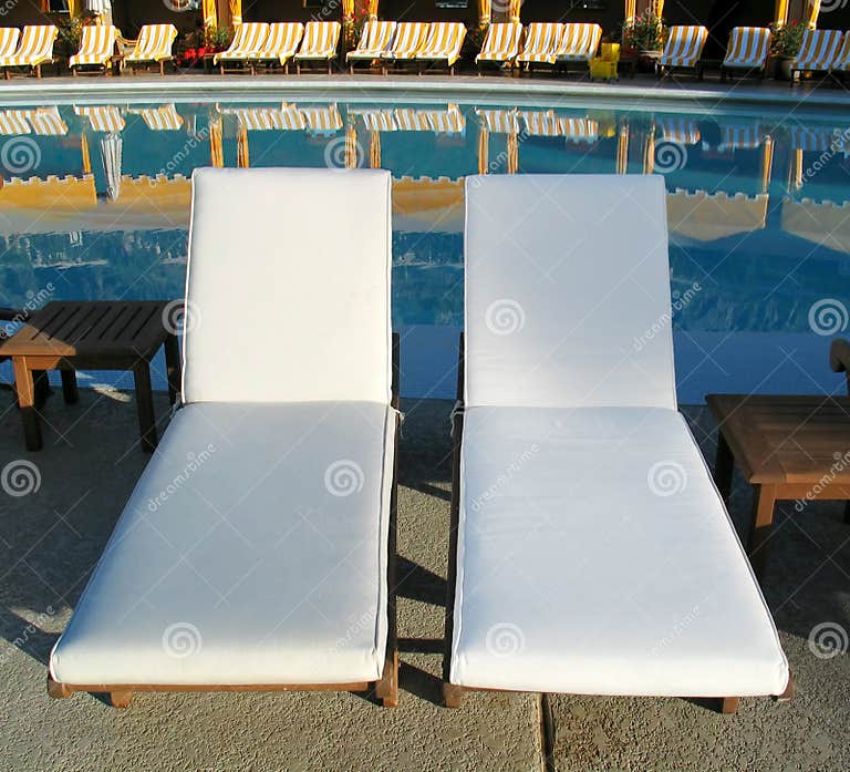 Deck Chairs at Resort Pool stock image. Image of relax - 309033