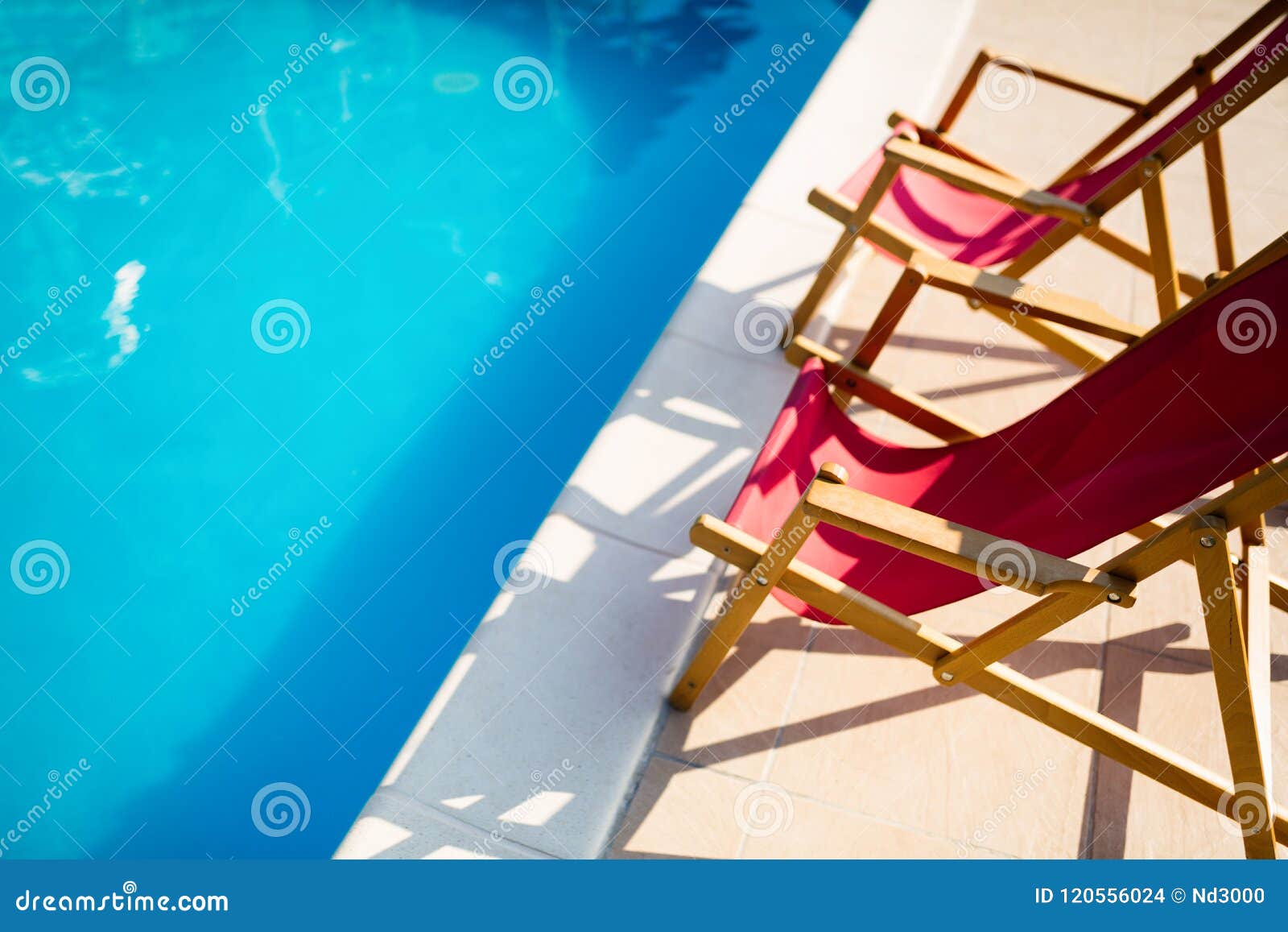 Deck Chairs at Side of Pool Stock Photo - Image of relax, lounge: 120556024