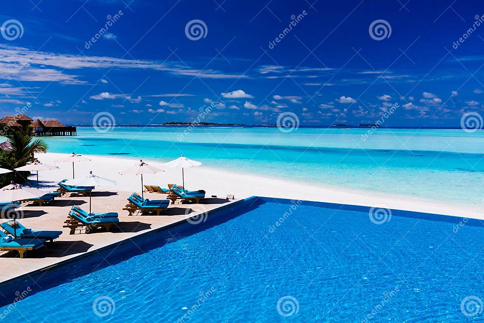 Deck and Infinity Pool Over Tropical Lagoon Stock Photo - Image of ...