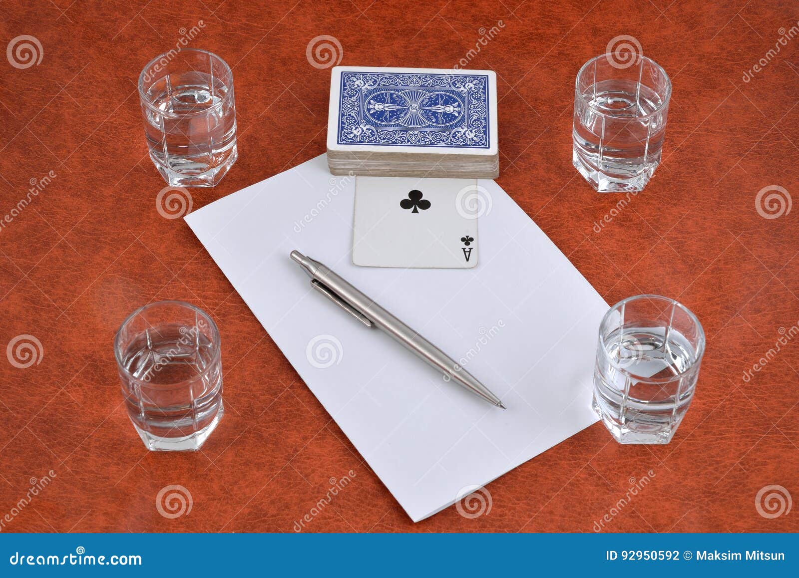 A Deck of Playing Cards, Pen, Paper and Stacks of Vodka on the T Stock ...