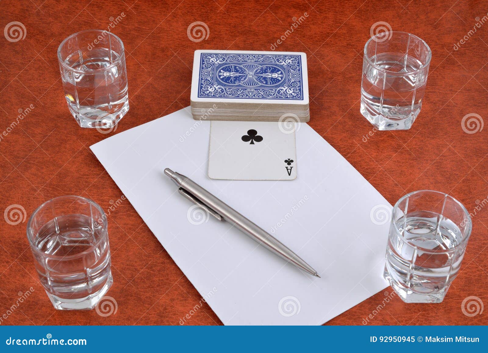 A Deck of Playing Cards, Pen, Paper and Stacks of Vodka on the T Stock ...