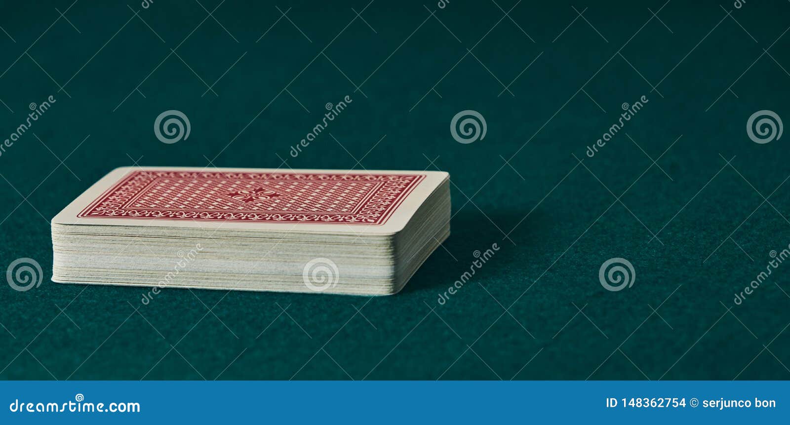 A Deck of Red Cards on the Green Game Mat Stock Photo - Image of baraja ...