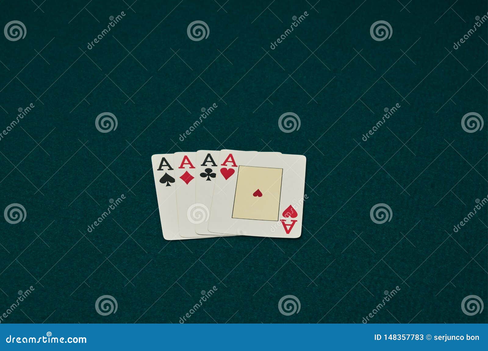 A Deck of Red Cards on the Green Game Mat in the Middle of the Image ...