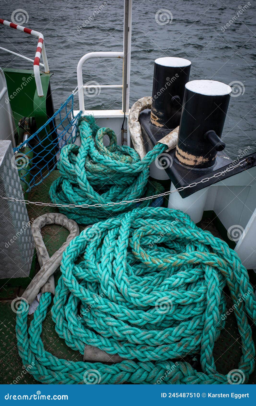 On the Deck of a Ship Lie Long Ropes for Mooring the Ship Stock Photo ...