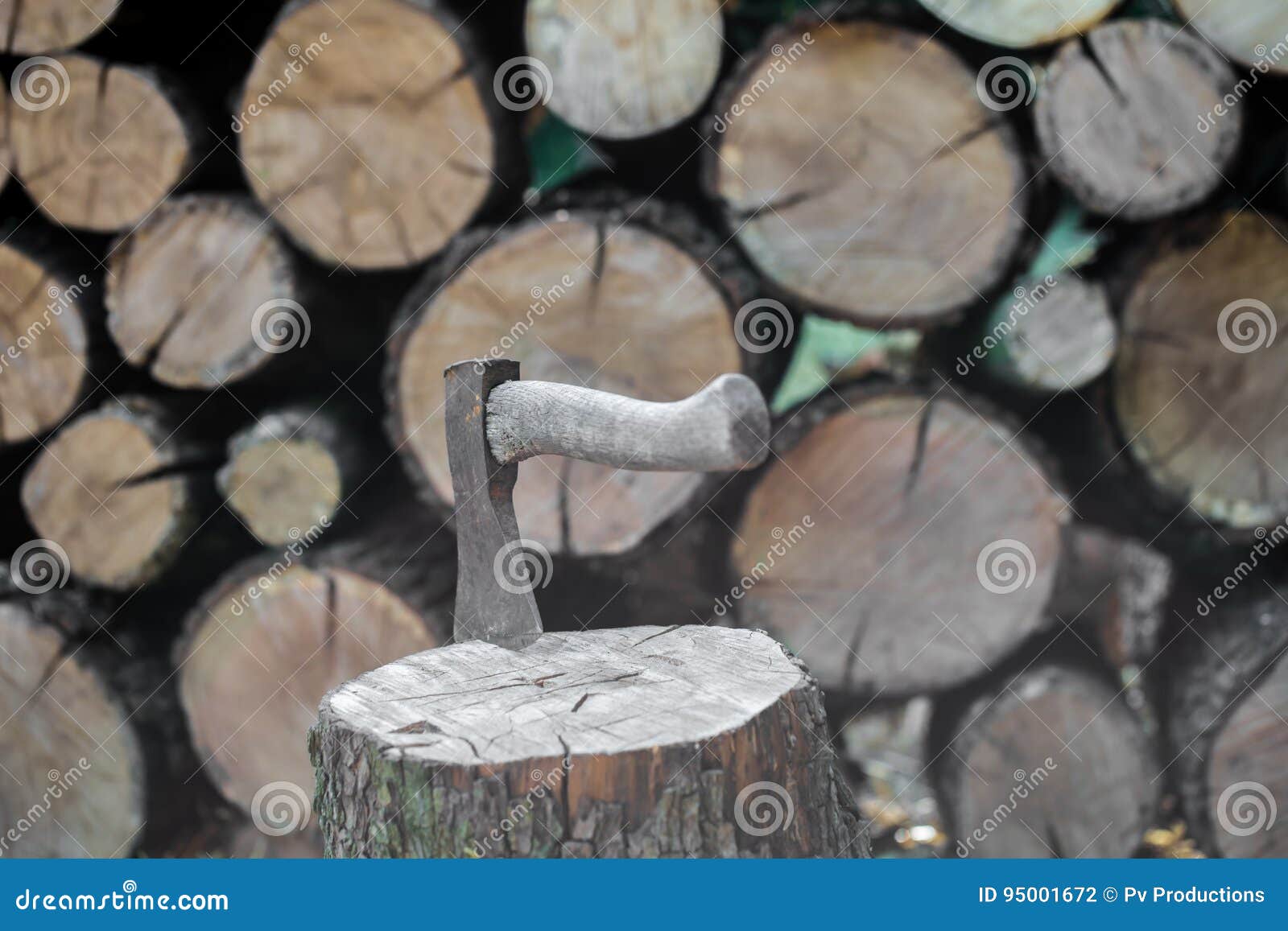 A Deck Of Stacked Logs And An Axe Stock Photo | CartoonDealer.com #95001672