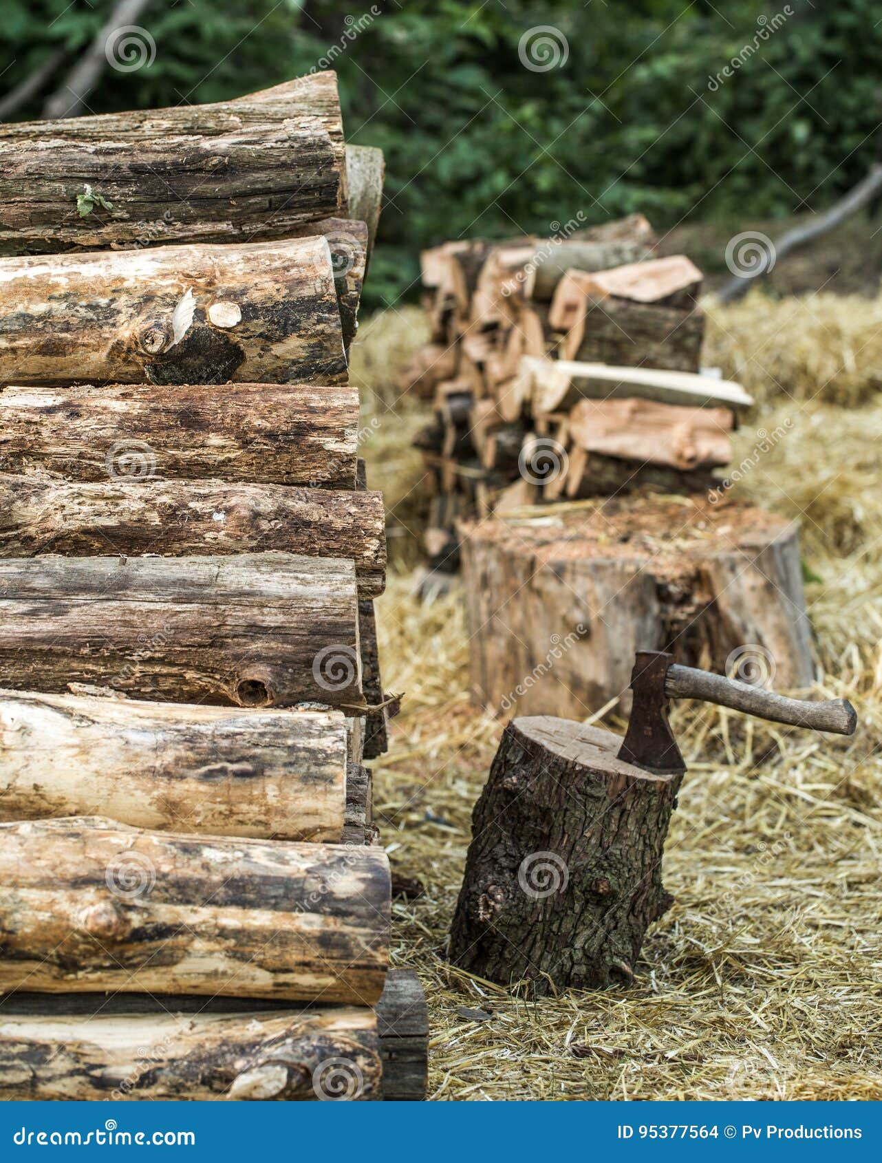 A Deck of Stacked Logs and an Axe Stock Photo - Image of splitter, chop ...