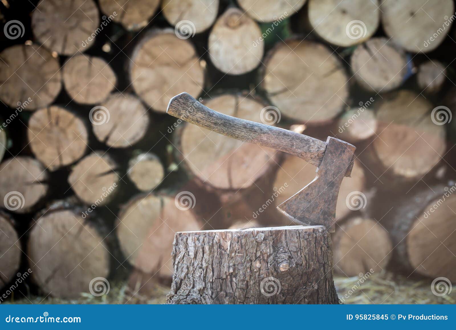 A Deck of Stacked Logs and an Axe Stock Image - Image of instrument ...