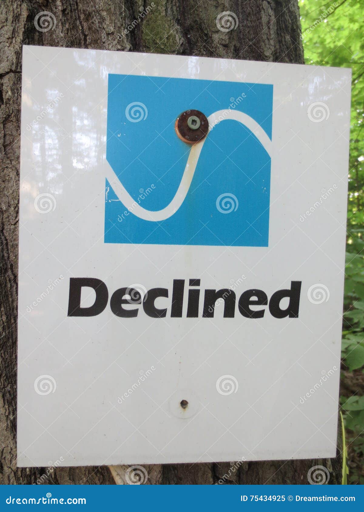 Declined Directional Sign stock image. Image of forest - 75434925
