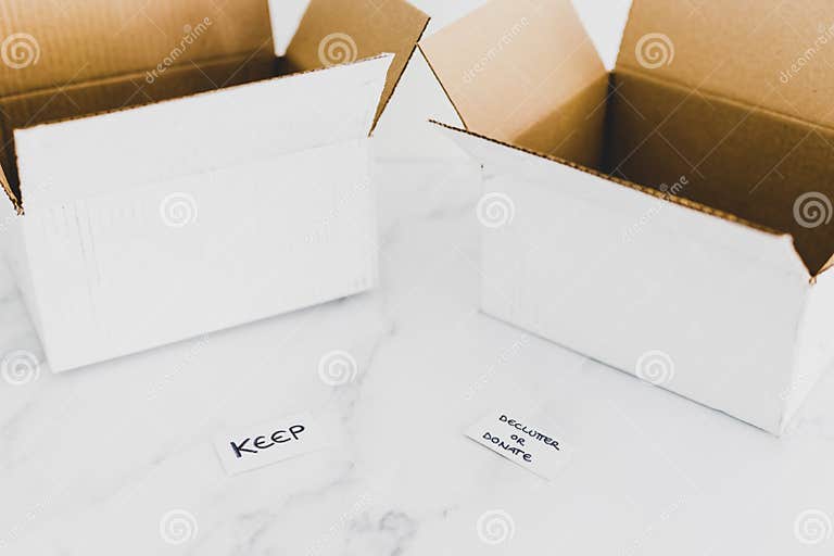 Decluttering Concept, Storage Boxes To Sort between Objects To Keep and ...
