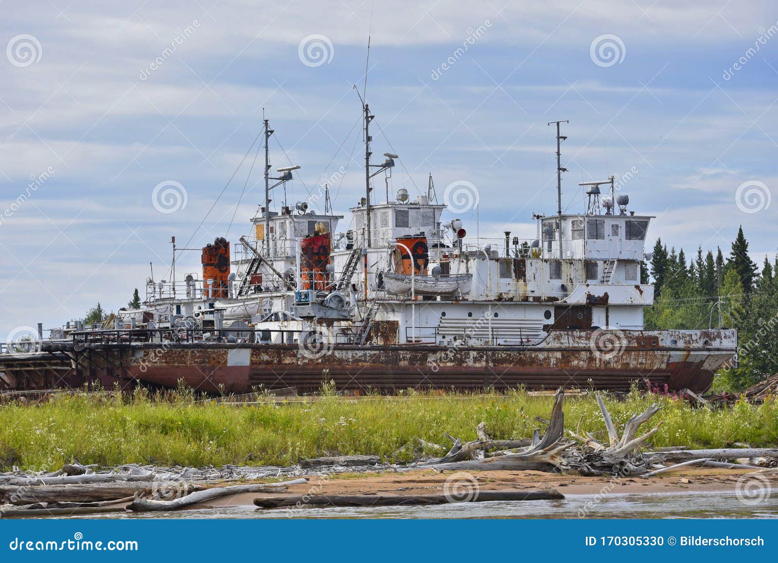 Decommissioned Ships, Cut and Left on the Shore Stock Photo - Image of ...