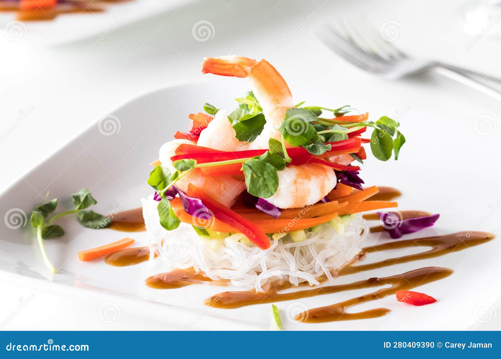 A Deconstructed Salad Roll Stacked Salad Served With Sparkling Water ...