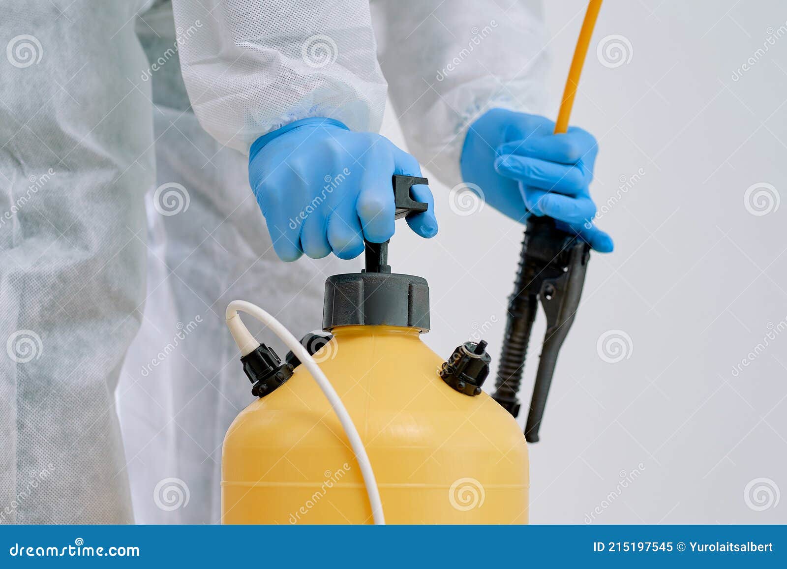 Decontamination Service Worker Using a Container of Disinfectant. Stock ...